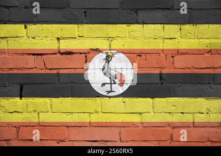 Uganda flag is painted onto an old brick wall Stock Photo - Alamy