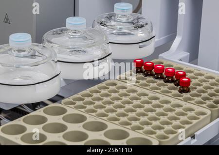 Vials in automated scientific testing equipment, USA Stock Photo - Alamy