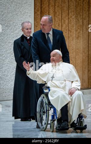 Pope Francis arrives in the Paul VI Hall for his weekly general ...