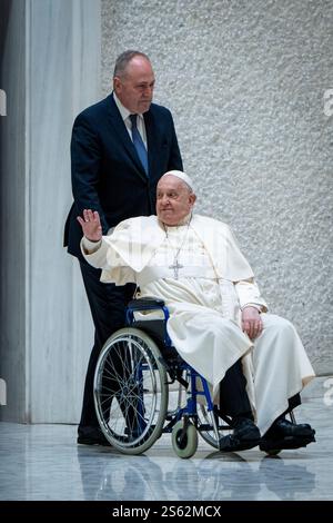 Pope Francis arrives in the Paul VI Hall for his weekly general ...
