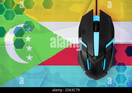 Comoros flag and modern backlit computer mouse. The concept of digital ...