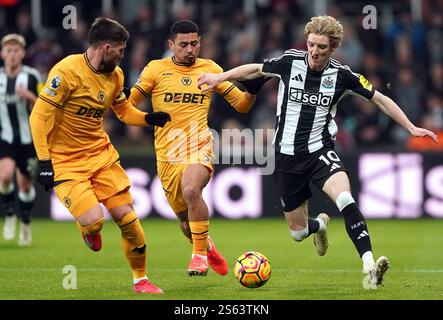 Wolverhampton Wanderers' Andre, Newcastle United's Bruno Guimaraes and ...