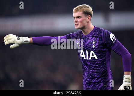 Tottenham Hotspur goalkeeper Antonin Kinsky celebrates with the trophy ...