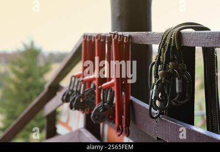 large metal locking carabiners with rope, climbing gear hanging on the ...