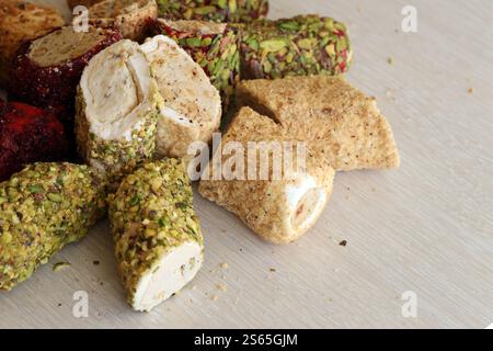 Rolls of turkish delight with different flavors and fillings close up ...
