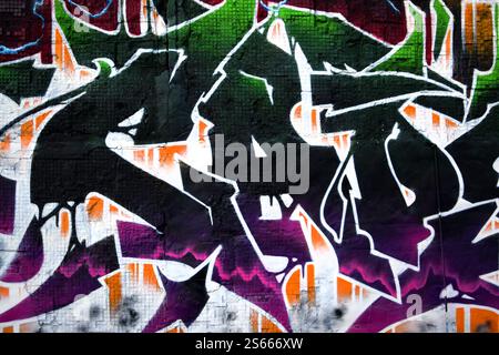 Close-up of colorful graffiti on wall Stock Photo - Alamy