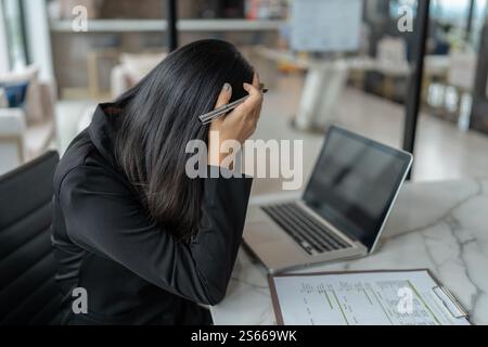 Burnout concept. Asian Business woman touching forehead having headache ...