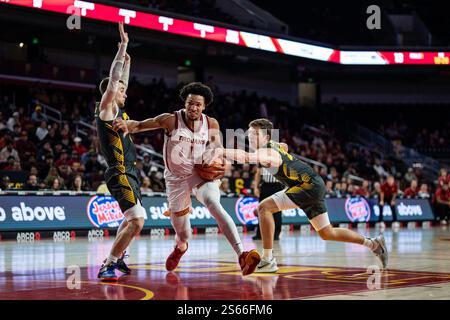 Iowa forward Pryce Sandfort (24) shoots over Wisconsin forward Carter ...