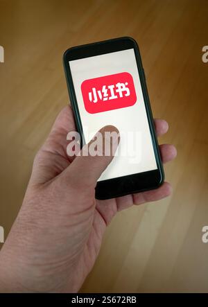 REDnote app on smartphone screen. Chinese social media application ...