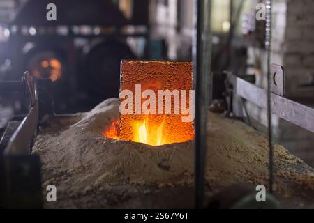Metal melting in an induction furnace Stock Photo - Alamy