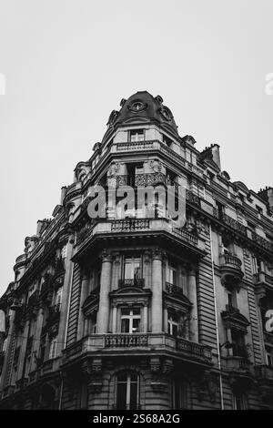 Classic Parisian Haussmann Building Facades with Ornate Wrought-Iron ...