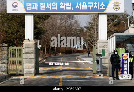 South Korean police officers stand in front of the Constitutional Court ...