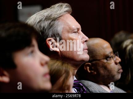 Treasury Secretary Scott Bessent listens as President Donald Trump ...