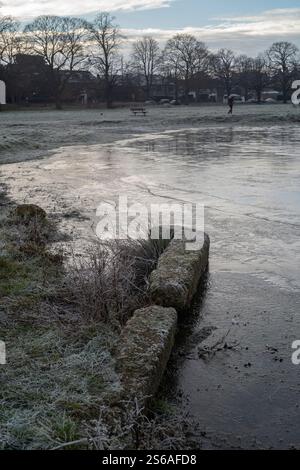 A frozen Rushmere Pond, during freezing temperatures on Wimbledon ...