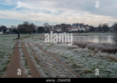 A frozen Rushmere Pond, during freezing temperatures on Wimbledon ...