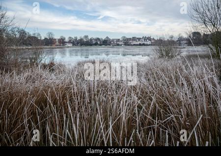 A frozen Rushmere Pond, during freezing temperatures on Wimbledon ...