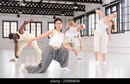 Dancers on stage, choreography with elements of theatrical production ...