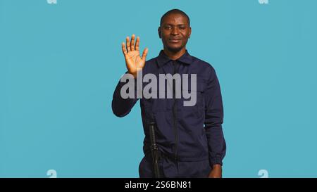 Portrait of security guard overseeing premises to prevent intrusion ...