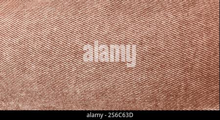 Rich mocha-toned denim jeans textile for any background. Faded fabric ...