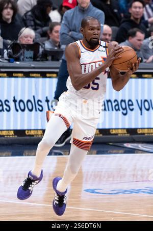 Phoenix Suns' Kevin Durant (35) shoots as Houston Rockets' Dillon ...