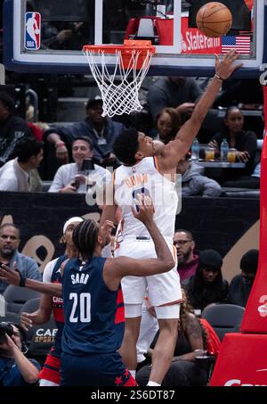 Phoenix Suns forward Ryan Dunn (0) attempts a shot against the ...