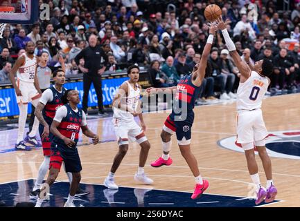 Phoenix Suns forward Ryan Dunn shoots during the first half of an NBA ...