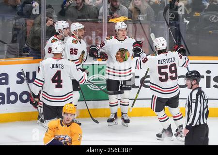 Chicago Blackhawks center Connor Bedard (98) celebrates his hat trick ...