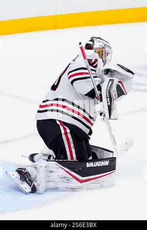 Chicago Blackhawks goaltender Arvid Soderblom defends the goal during ...