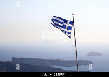 An image of the greek flag under a blue sky Stock Photo - Alamy