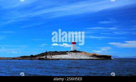 Hobart's Iron Pot lighthouse, freshly painted and seen from a harbour ...