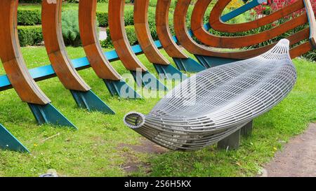 Nigel Helyer's 2018 sculpture of an Aboriginal bark canoe made in steel ...