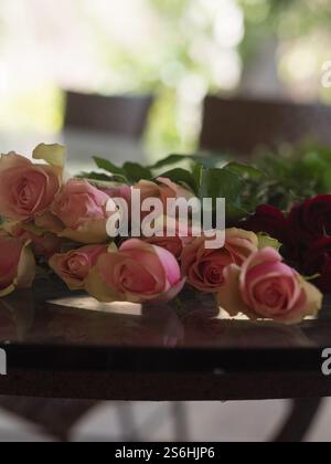 Garden terrace with blooming roses Stock Photo - Alamy