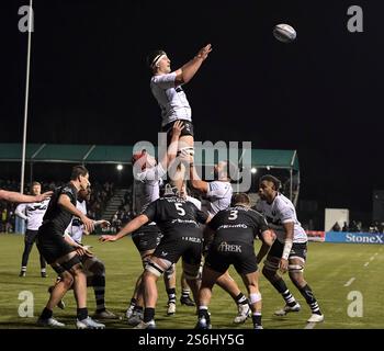 Ivan van Zyl of Saracens and Steele Barker of Bristol Bears in action ...