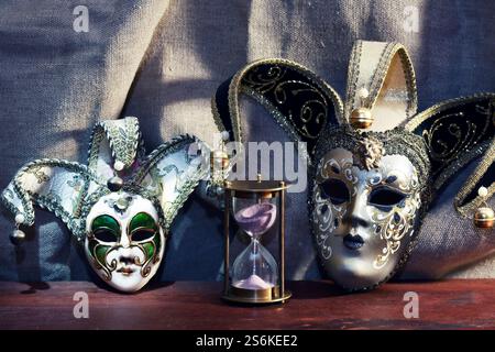Nice old Venetian mask near books on white background Stock Photo - Alamy