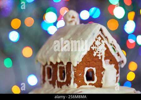 Close up of drawing gingerbread Christmas tree sugar cookie on wooden ...