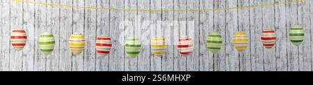 Easter eggs on a string Stock Photo - Alamy