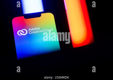 In this photo illustration, an Adobe Creative Cloud logo is seen ...