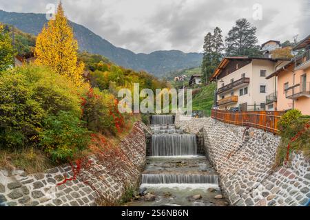 A step waterway with fall foliage color in the trees at Kollman, Colma ...