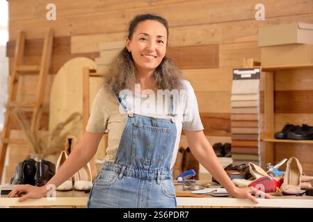 female shoemaker in workshop Stock Photo - Alamy