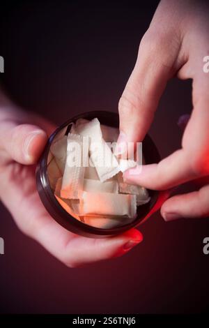 Snus, sachet of sucking tobacco Stock Photo - Alamy