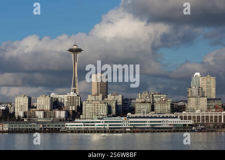 The Seattle Skyline shines at sunset from Elliott Bay on Saturday ...