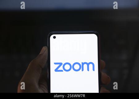 Zoom Workplace logo is displayed on smartphone Stock Photo - Alamy