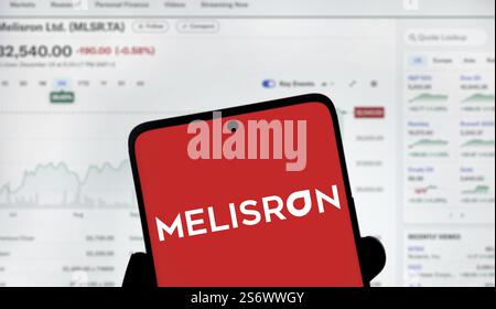 Melisron logo is displayed on smartphone. Melisron Ltd is an Israel based investment company ...