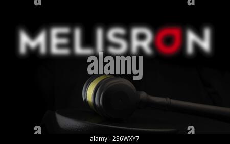 Court gavel in front of the Melisron logo. Melisron Ltd is an Israel based investment company ...