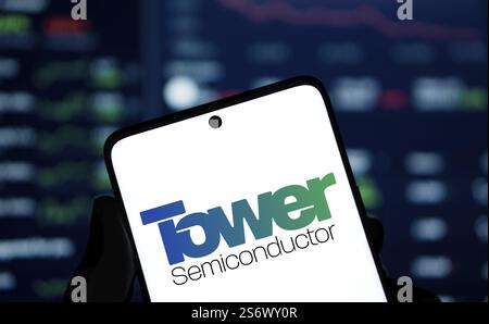 Tower semiconductor logo is displayed on smartphone. Tower ...