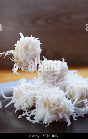 Khanom Tom, Thai Traditional Dessert of Coconut Ball Dumpling with ...