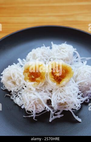 Khanom Tom, Thai Traditional Dessert of Coconut Ball Dumpling with ...