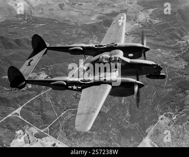 A Lockheed P-38 Lightning, a twin-engine fighter aircraft, photographed ...