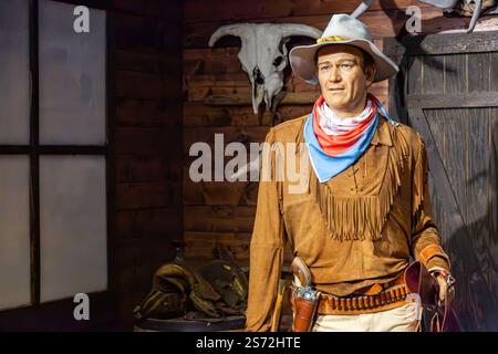 A wax figure representing actor John Wayne at the Hollywood Wax Museum ...