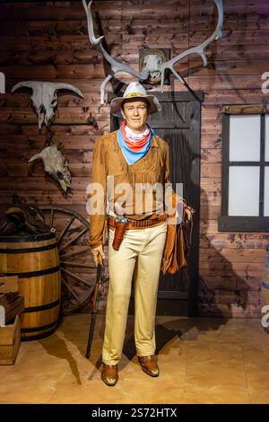 A wax figure representing actor John Wayne at the Hollywood Wax Museum ...